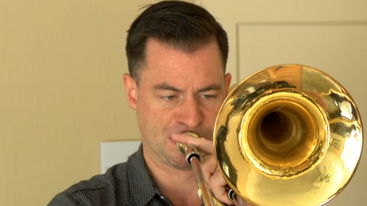 CHEK Upside: Local trombonist putting together community band medleys