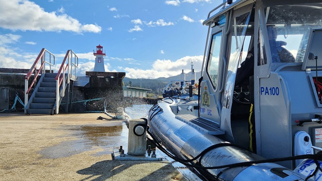 Two boaters trapped in rough waters rescued after vessel sinks in ...